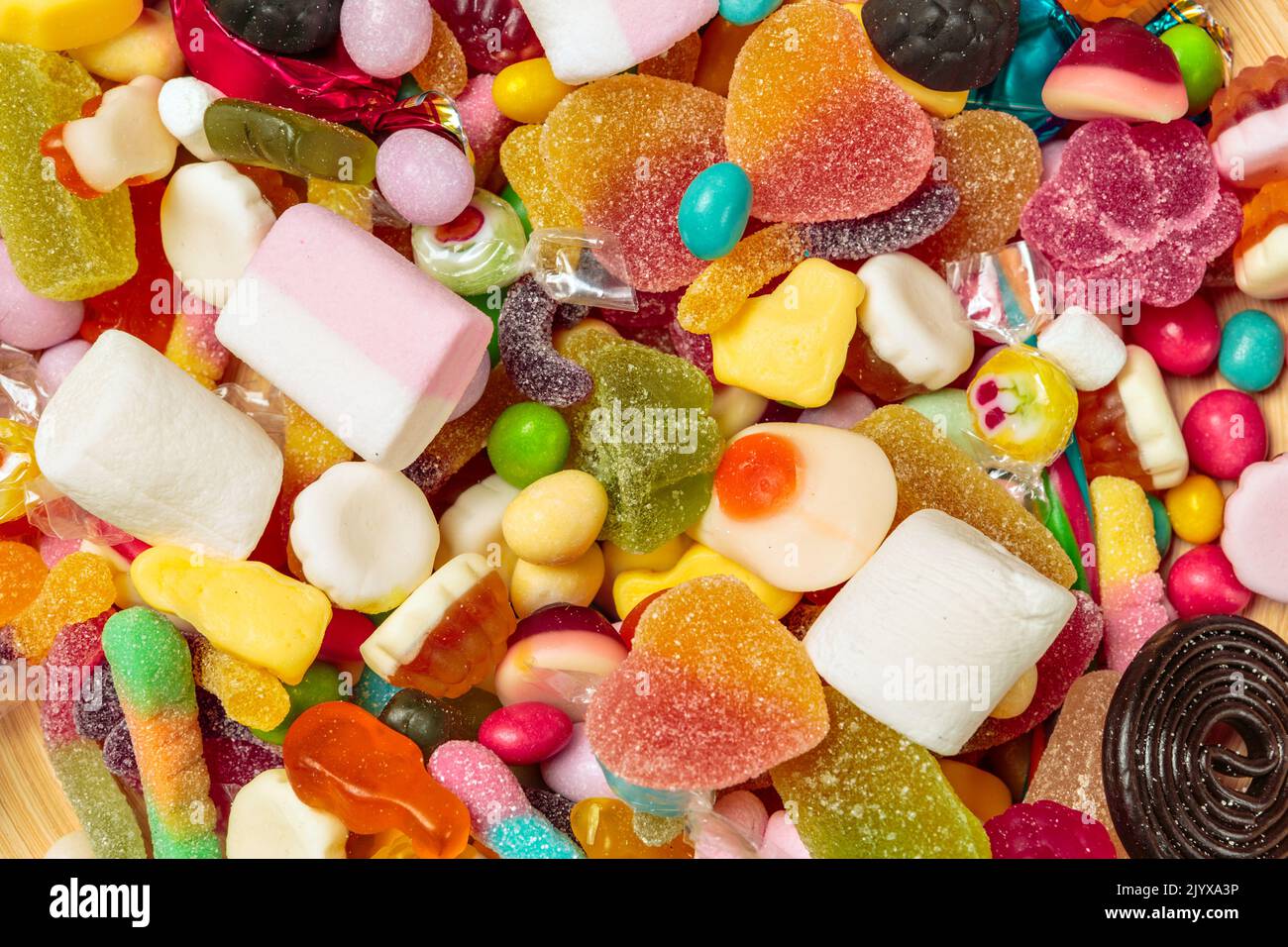 Different colorful fruit candy Stock Photo - Alamy