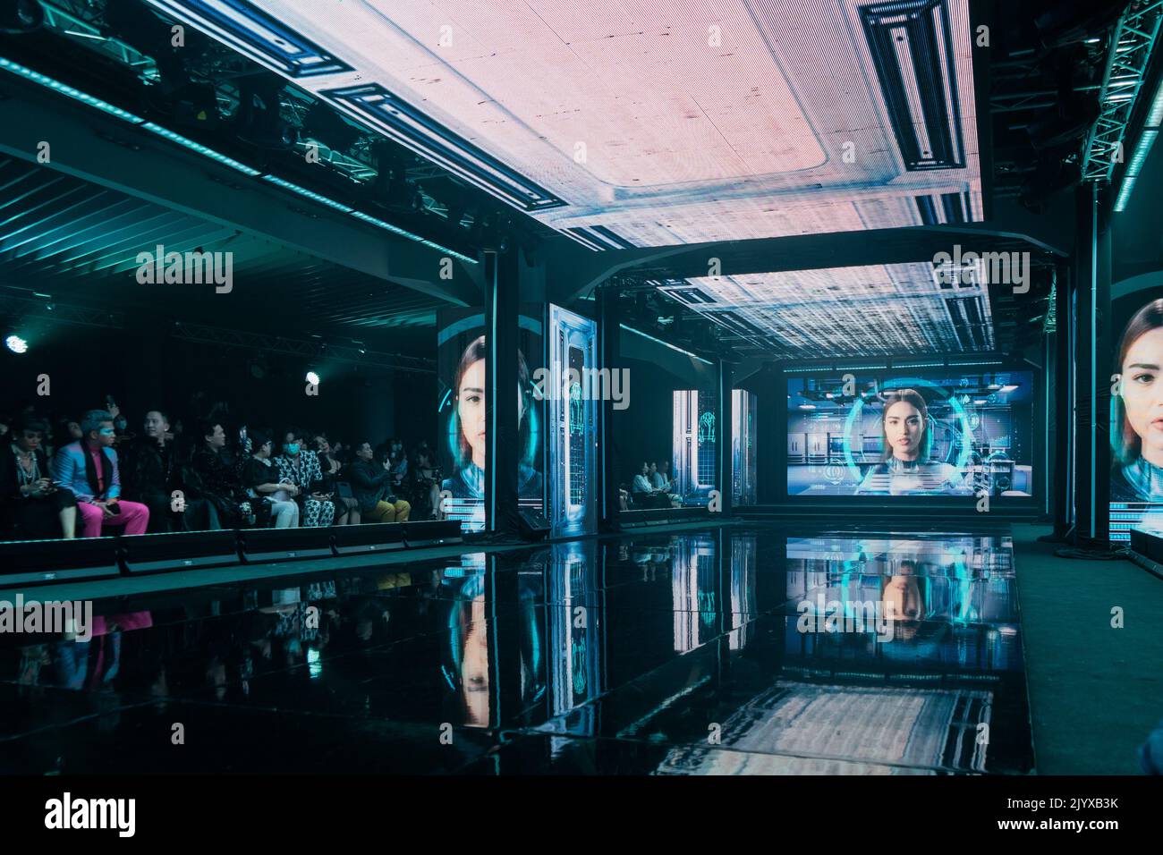 An "AI Model" gives an intro speech on the runway as the metaverse ...