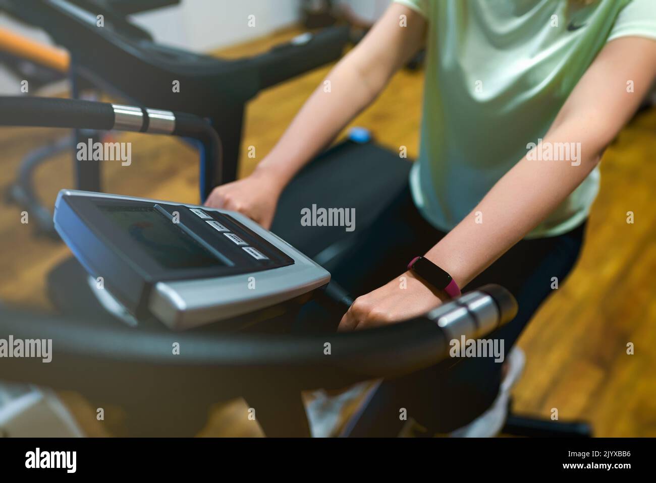 Woman jogging on treadmill at the home gym Stock Photo - Alamy
