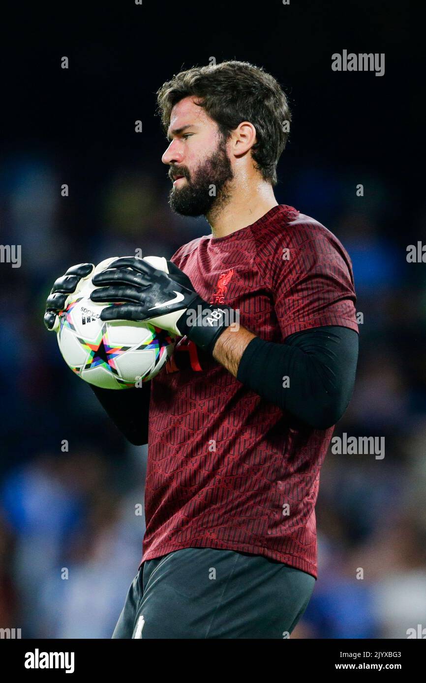 Liverpool's Brazilian goalkeeper Alisson Becker controls the ball ...