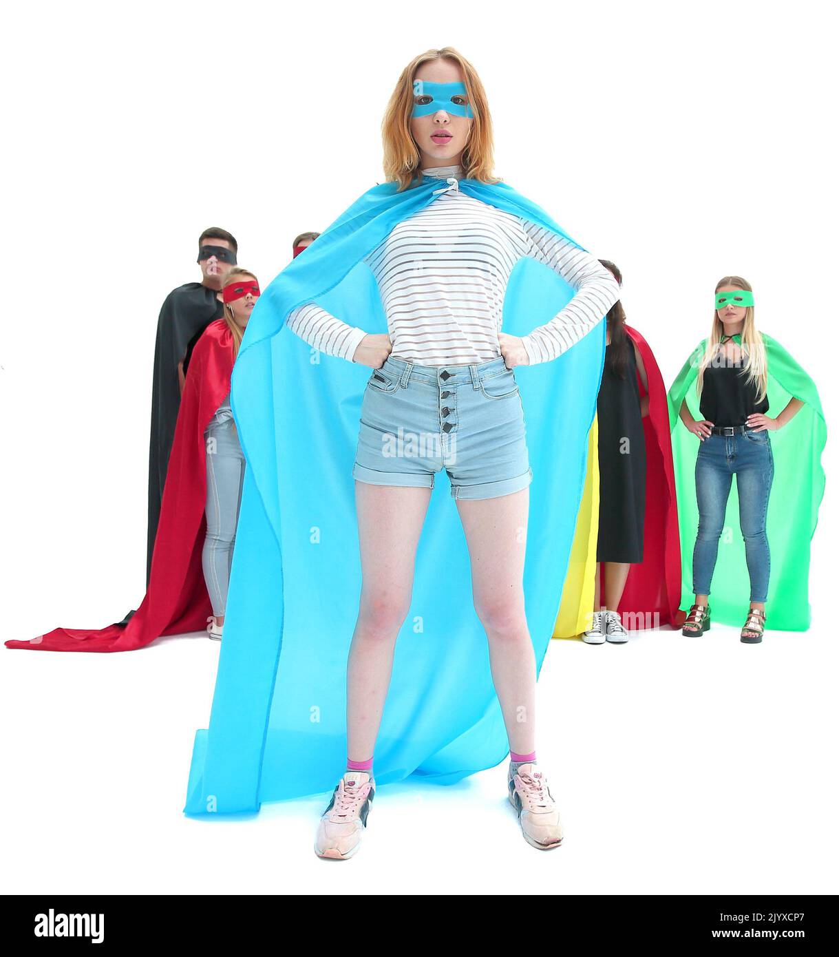 girl leader in superhero Cape standing in front of super team Stock ...