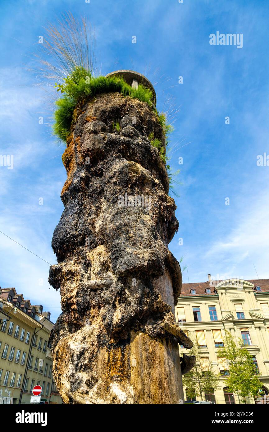 Meret Oppenheim Fountain with growth of limestone tufa, plants and ...