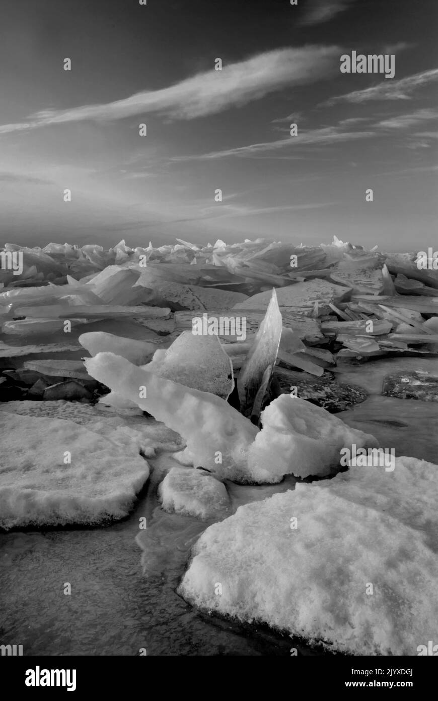 Lake Michigan shore ice turns blue in the twlight shade on the ...