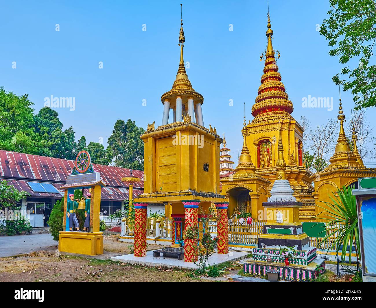 Panoramic view of the golden Chedi, mini-stupas, belfry and tiny ...