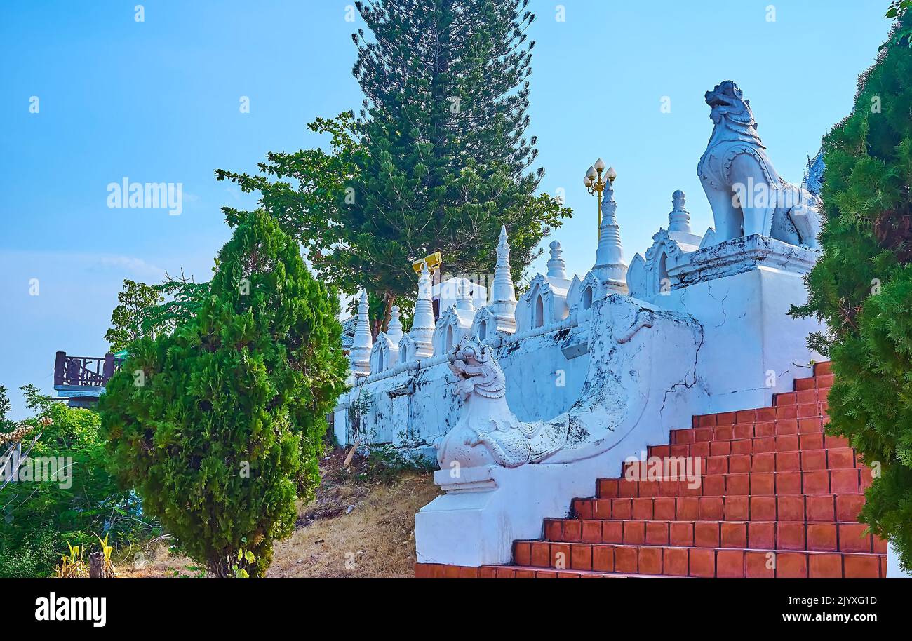 The white statues of Mom aquatic mythic creature and Singha (Chinthe ...