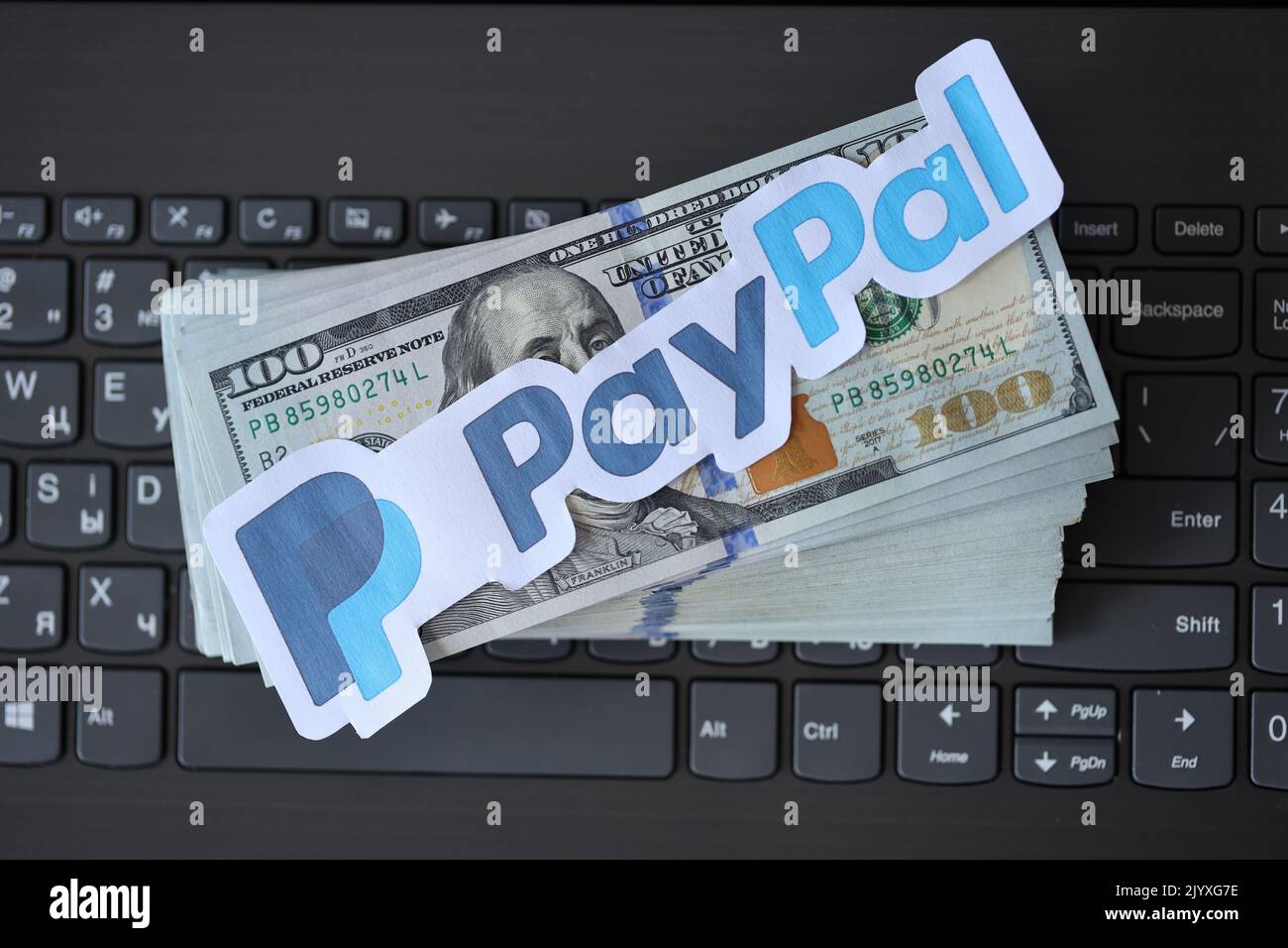TERNOPIL, UKRAINE - SEPTEMBER 6, 2022 Paypal paper logotype lies on ...