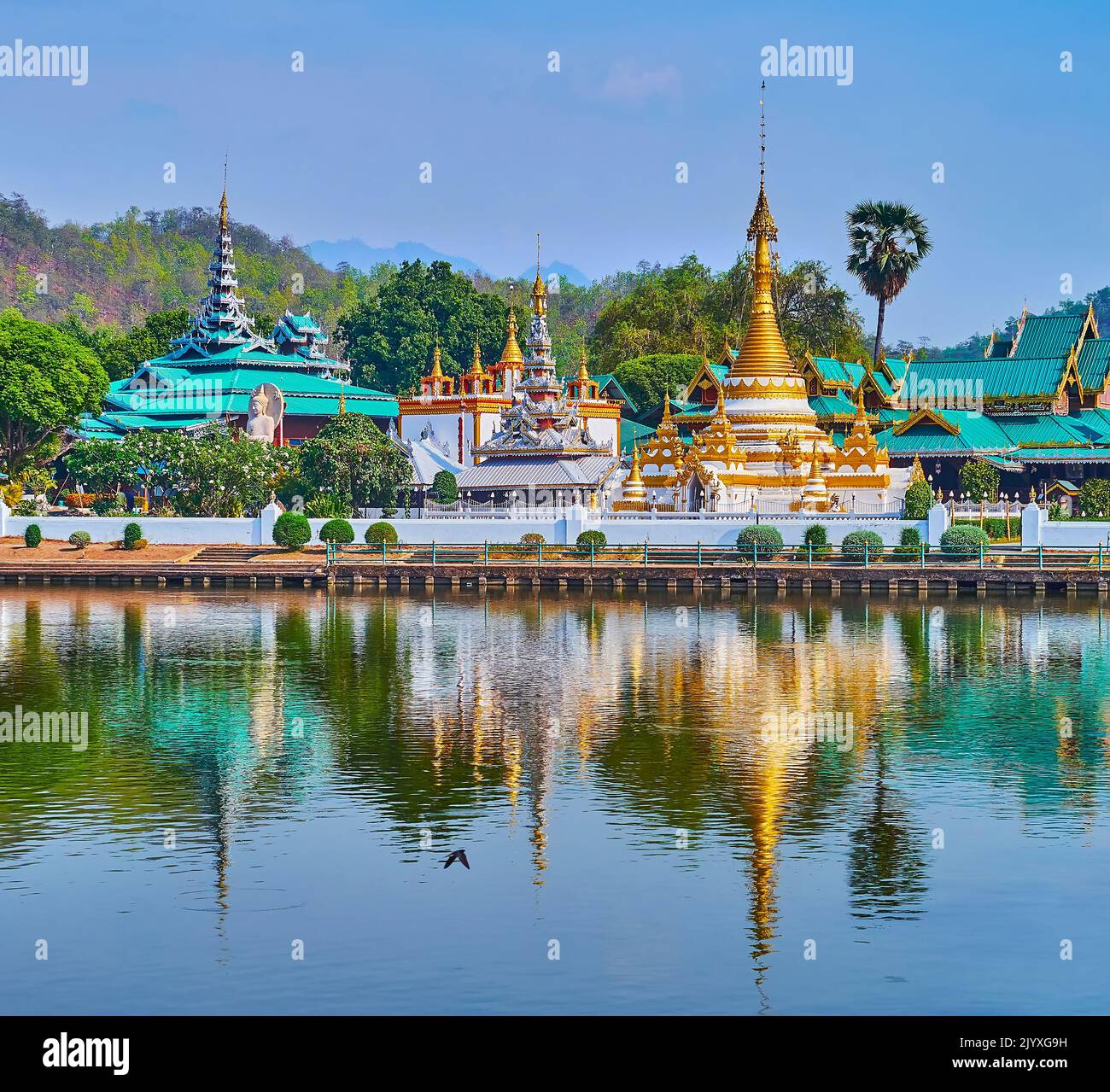Historic Wat Chong Kham and Wat Chong Klang Temples and reflection of ...