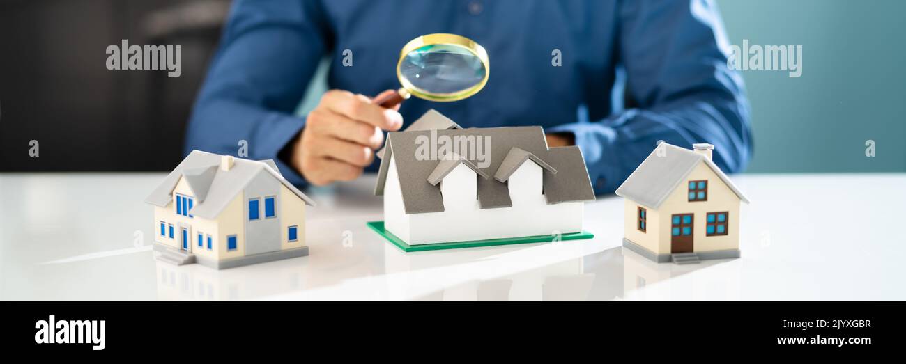 Real Estate House Inspector Checking Property Using Magnifying Glass ...