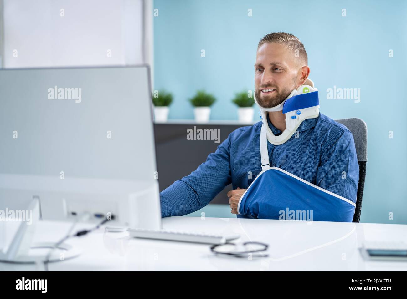 Male office employee disability in hi-res stock photography and images - Alamy