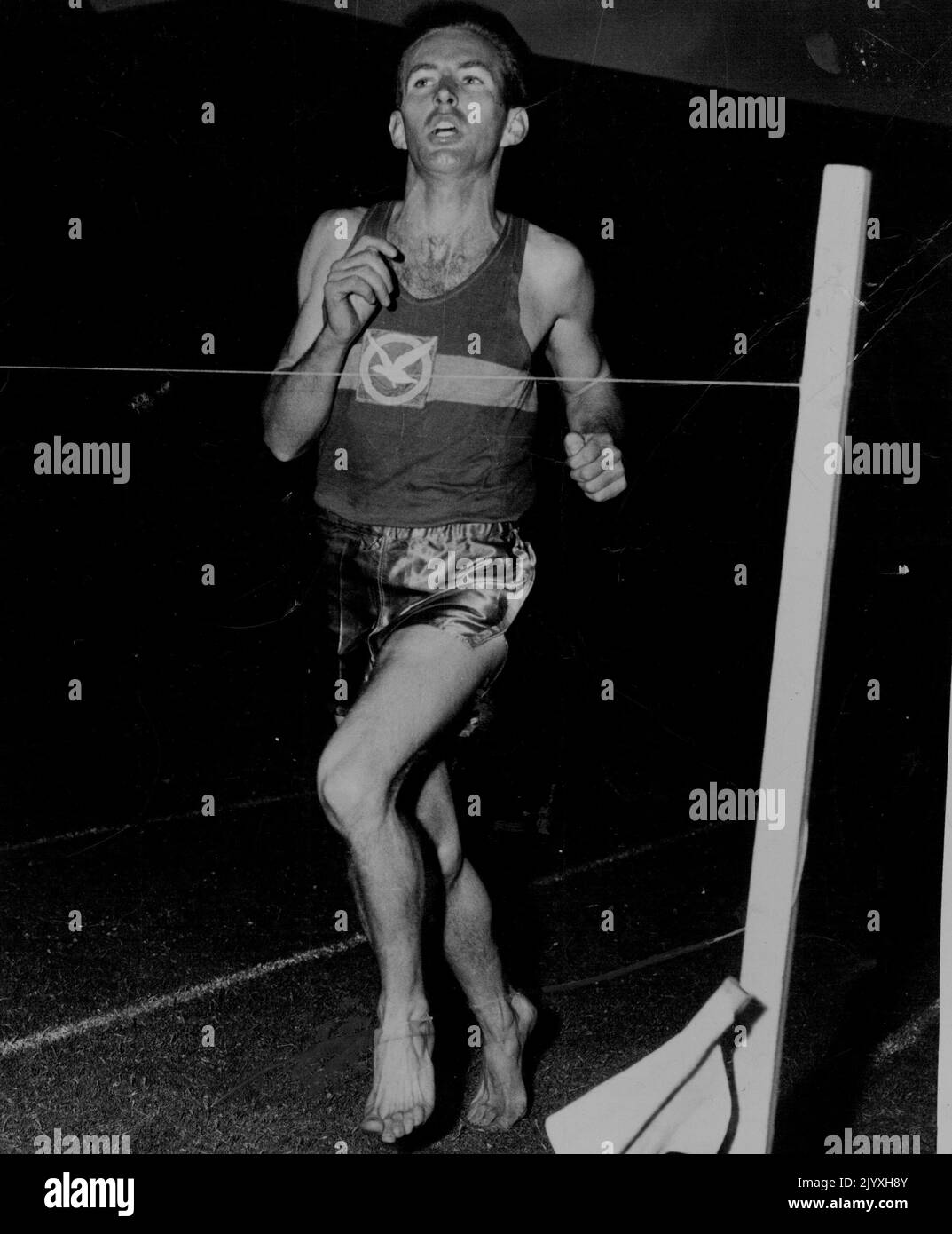 bout to break through the tape at the end of his sensational two ...