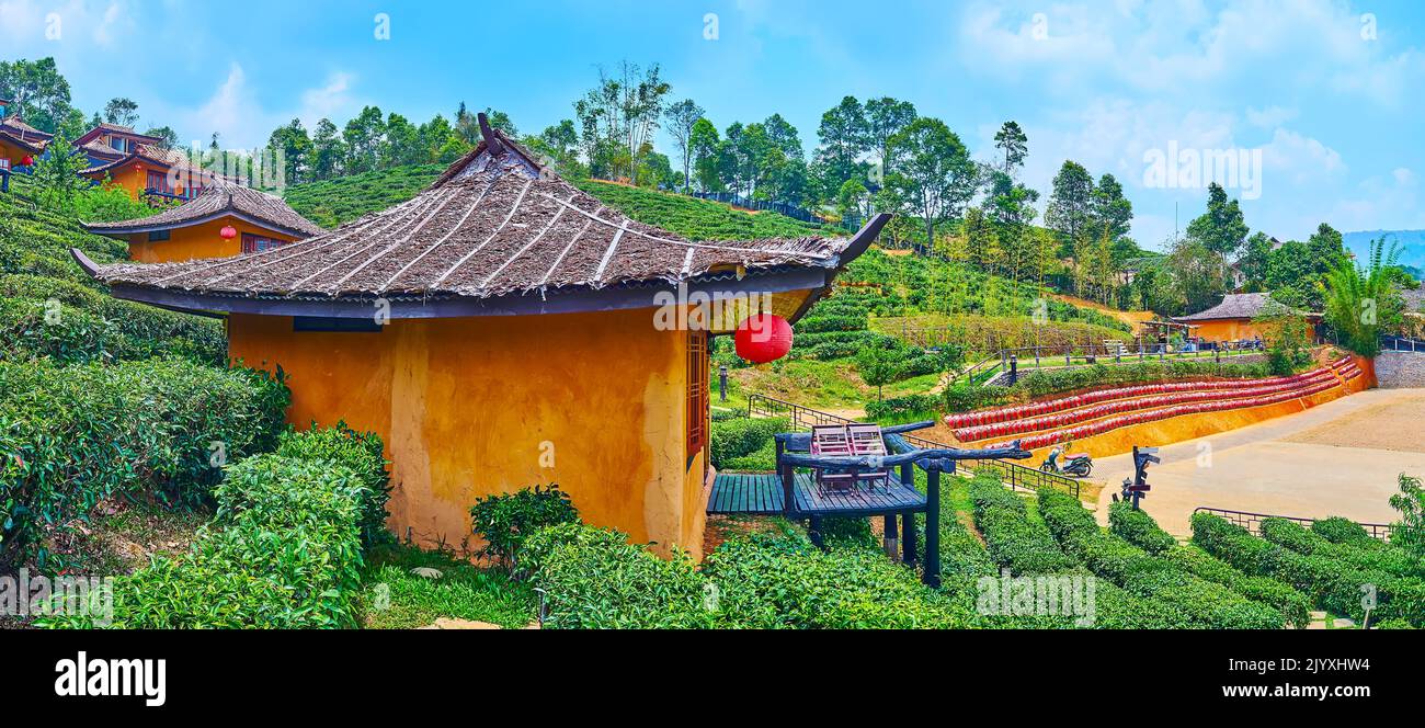 Panorama of Ban Rak Thai Yunnan tea village with tea shrubs and Chinese ...