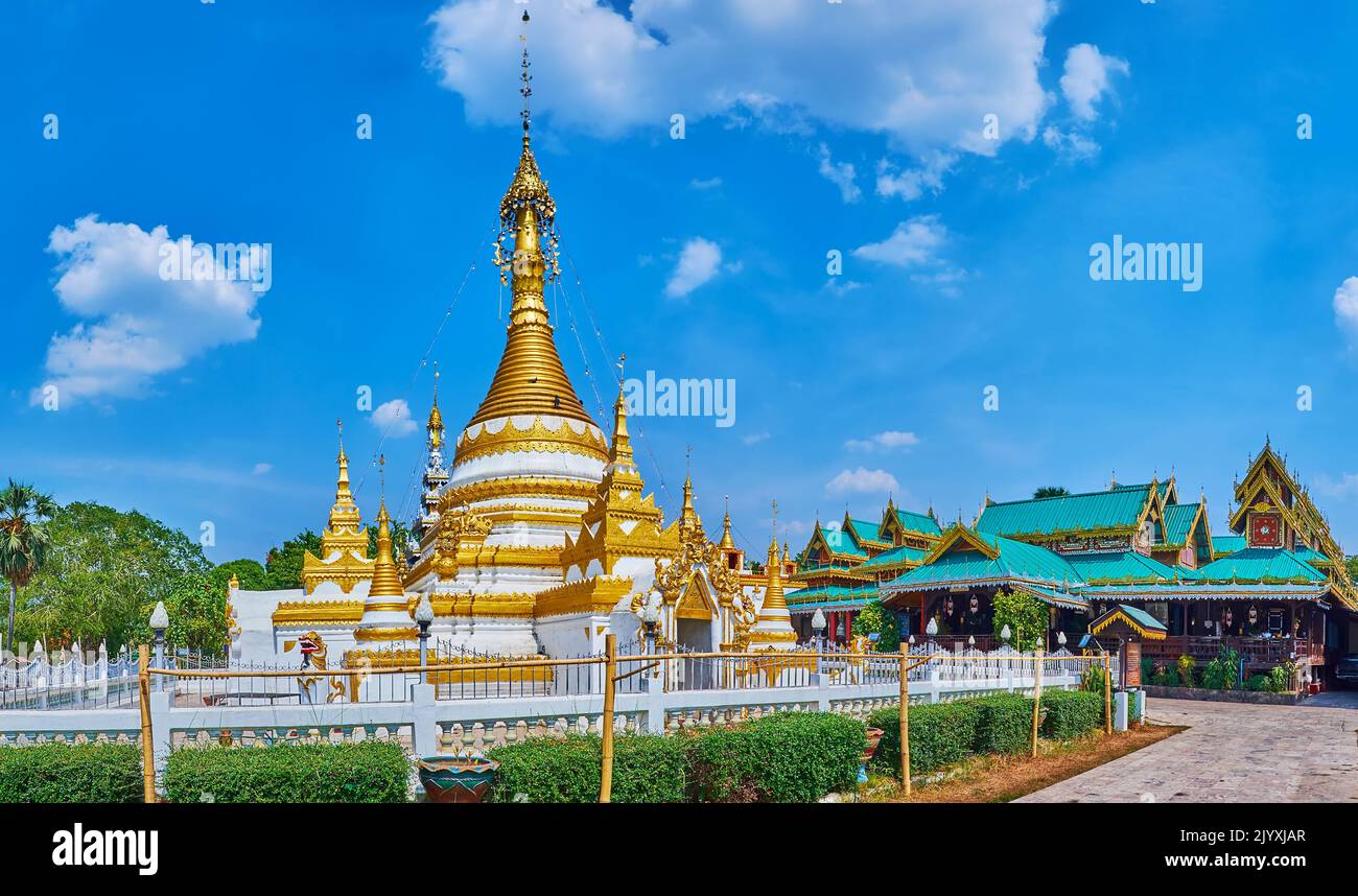 Panorama with richly decorated white-golden Chedi of Wat Chong Klang ...