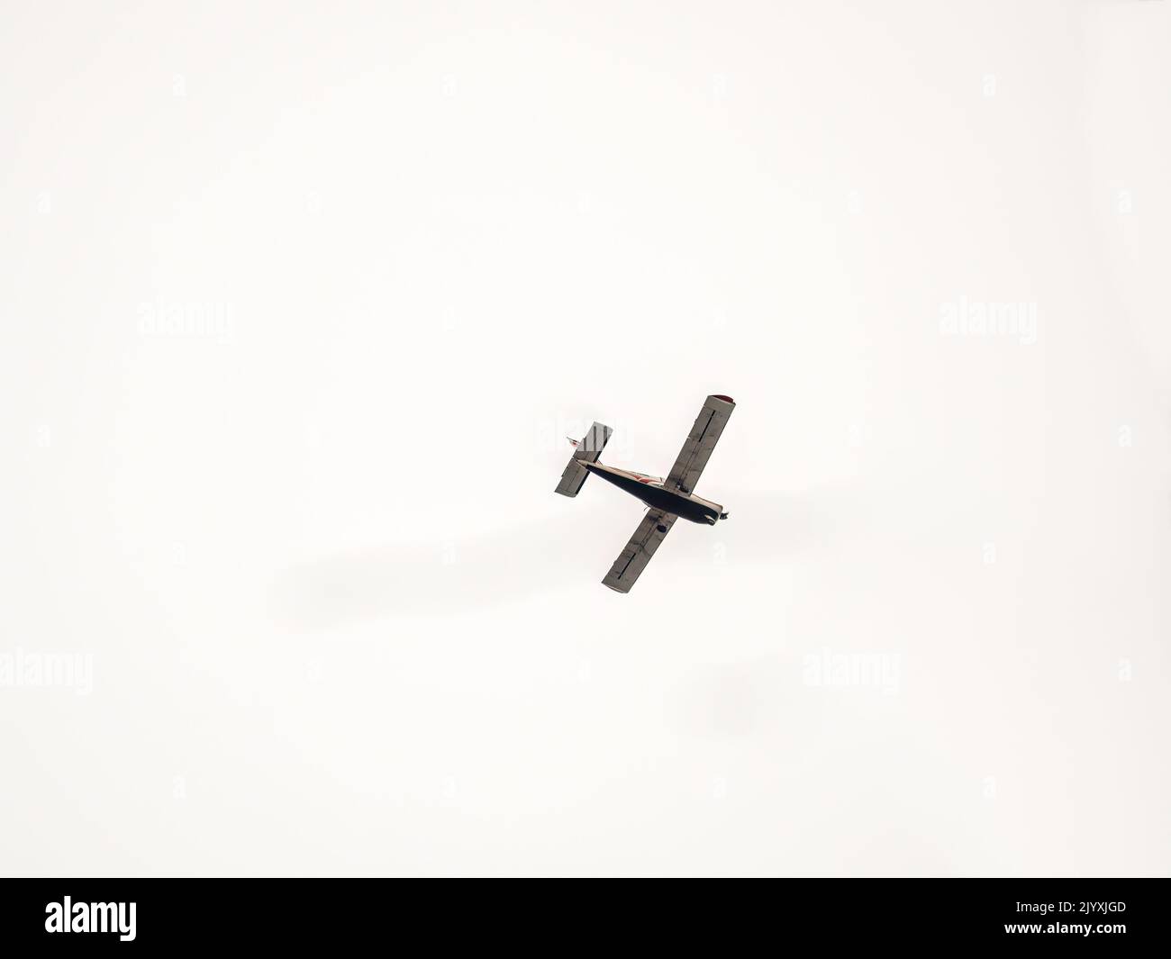 Small ultralight airplane with overhead wing and single propeller ...