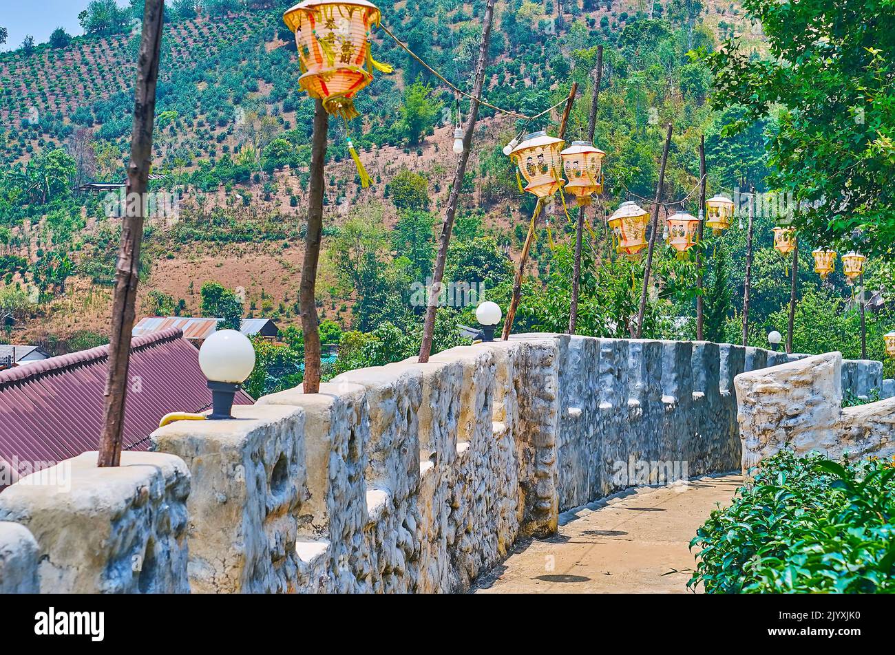 Enjoy the rampart walk with a view on small Chinese lanterns and green ...