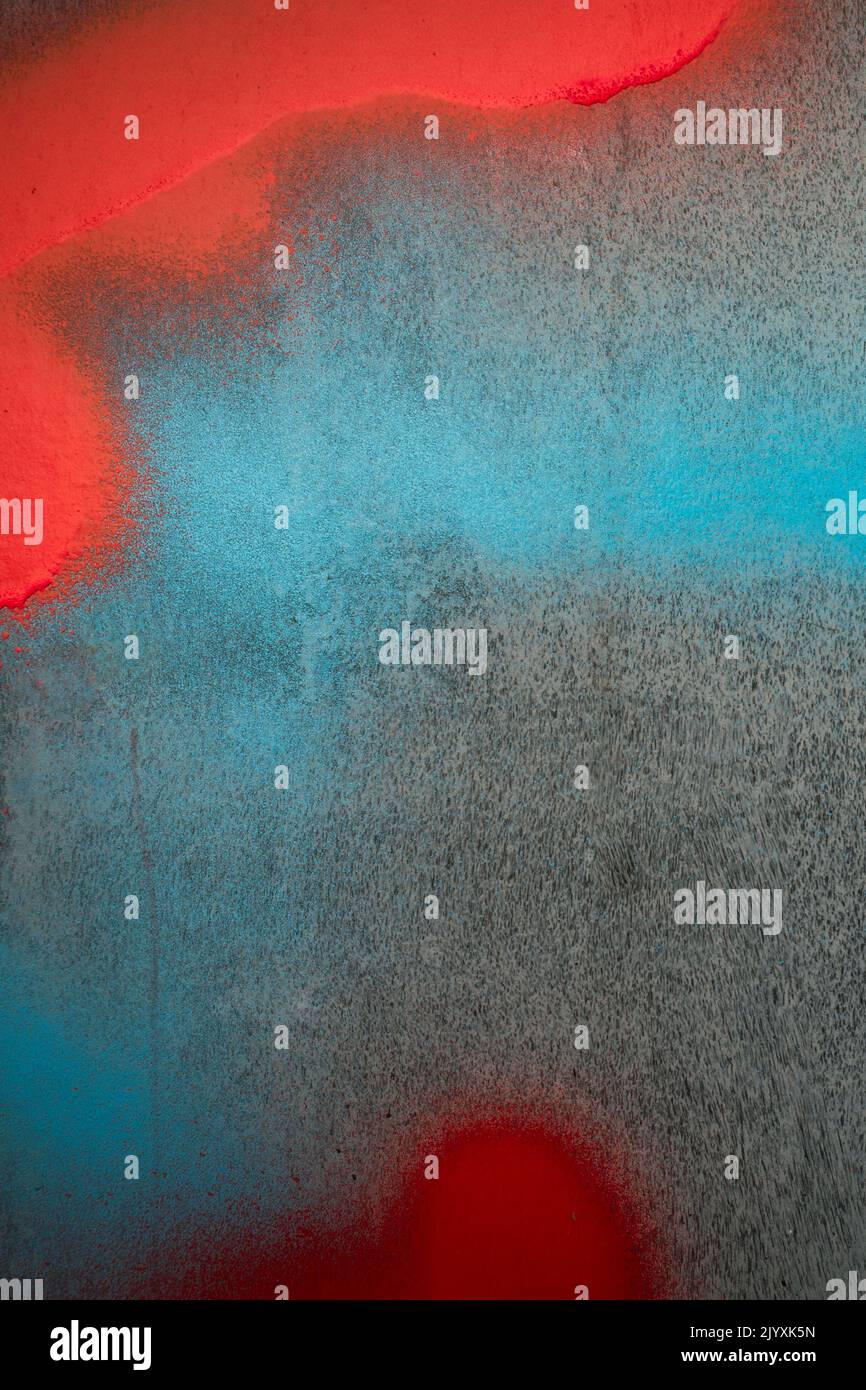 Fragment of the wall with blue red colors graffiti painting. Part of ...