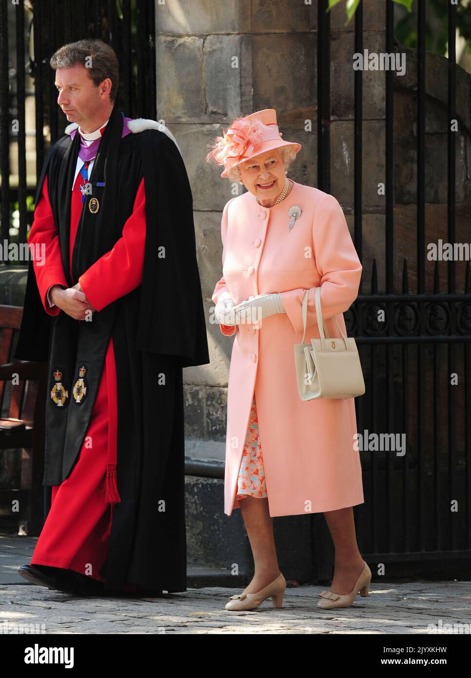File photo dated 30/7/2011 of Queen Elizabeth II wearing a Stewart ...