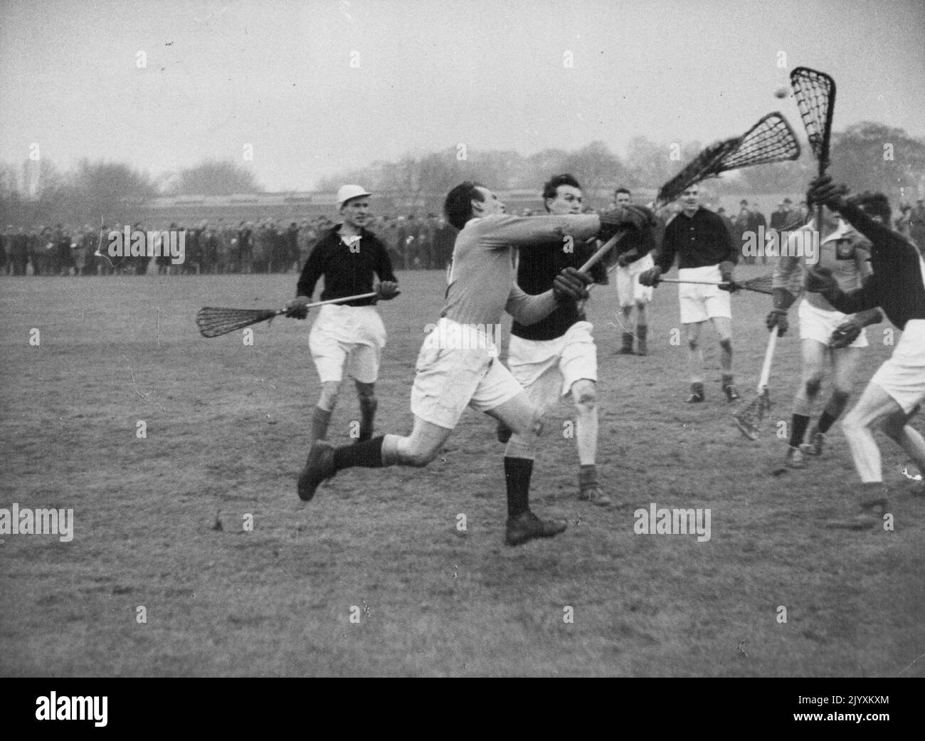 A south player evades a tackle on his progress towards the North goal ...