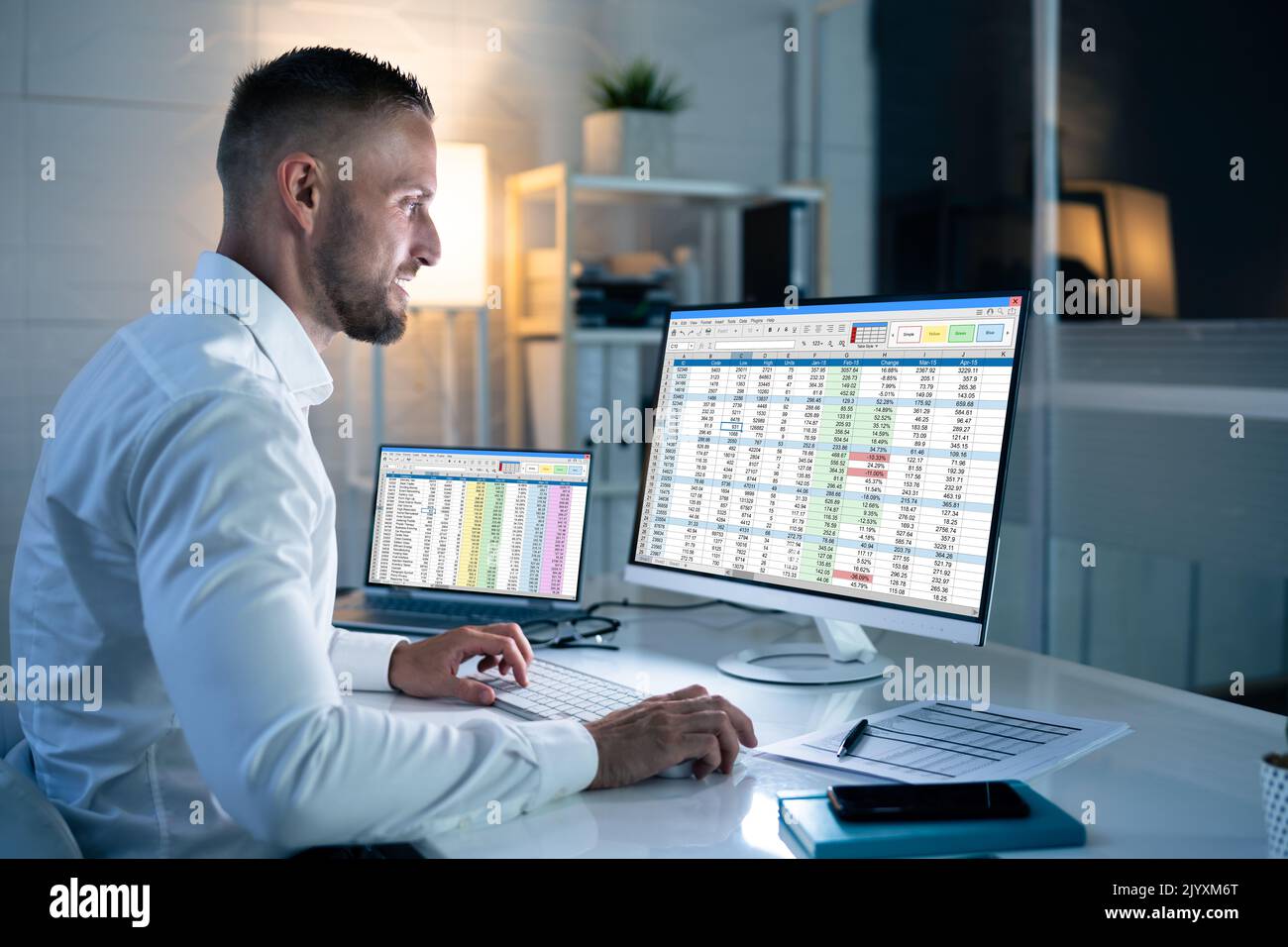 Analyst Working With Spreadsheet Business Data On Computer Stock Photo ...