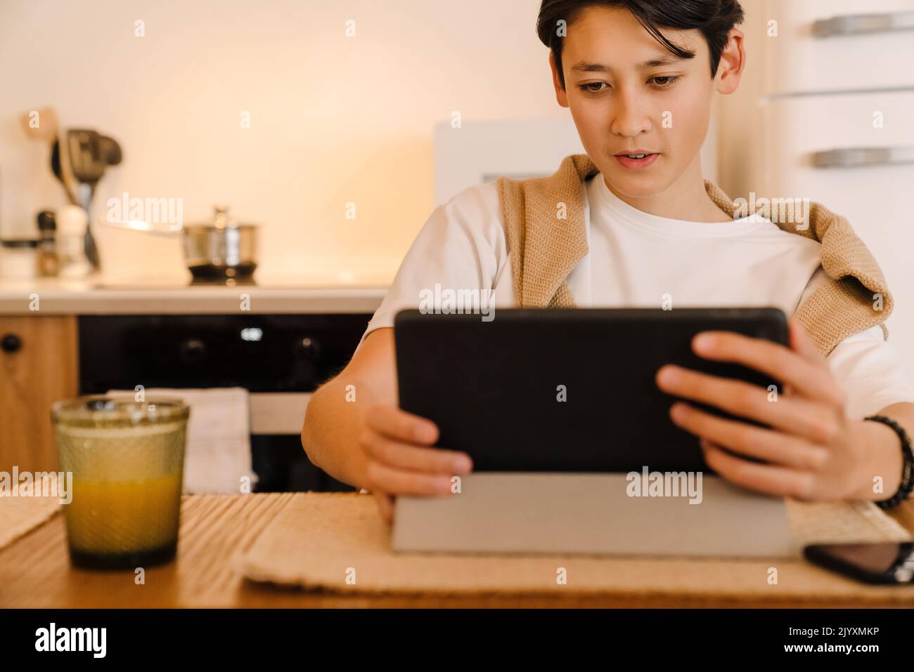Asian teenager boy computer hi-res stock photography and images - Alamy
