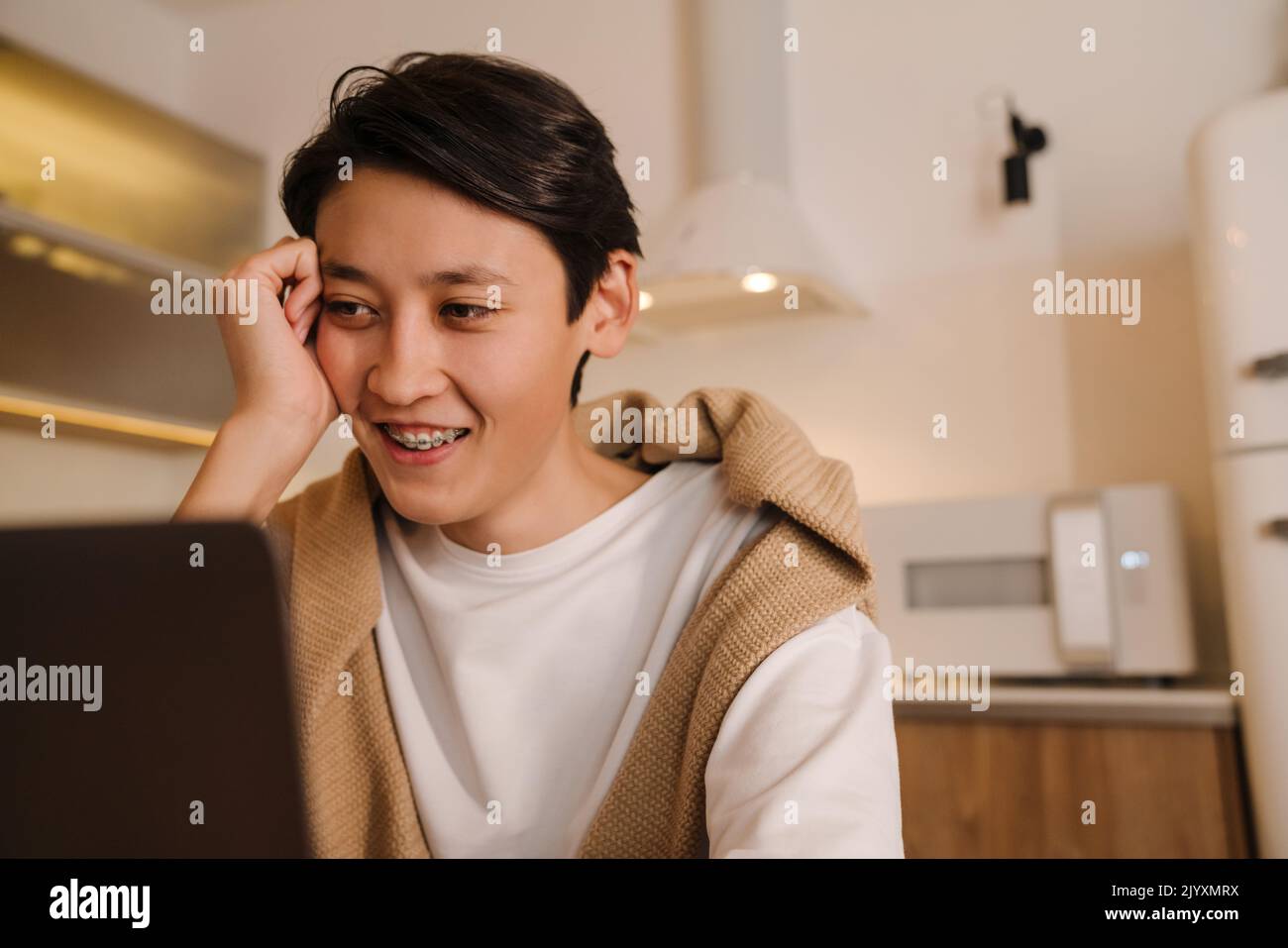 Asian teen boy laptop hi-res stock photography and images - Alamy