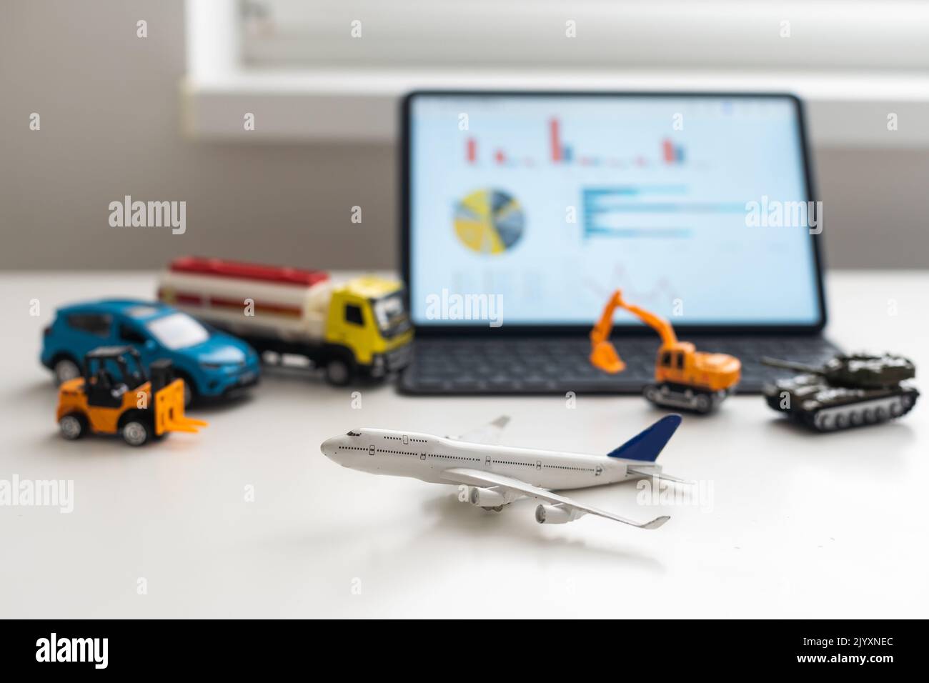 Tablet computer with different types of toy transport. auto center ...