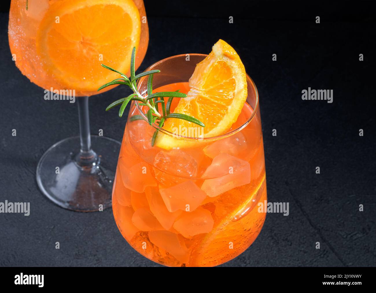 Classic italian aperitif aperol spritz cocktail in two wineglasses with ...