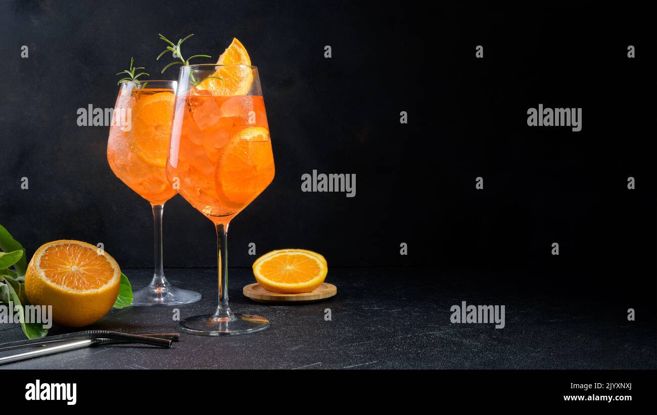 Classic italian aperitif aperol spritz cocktail in two wineglasses with ...