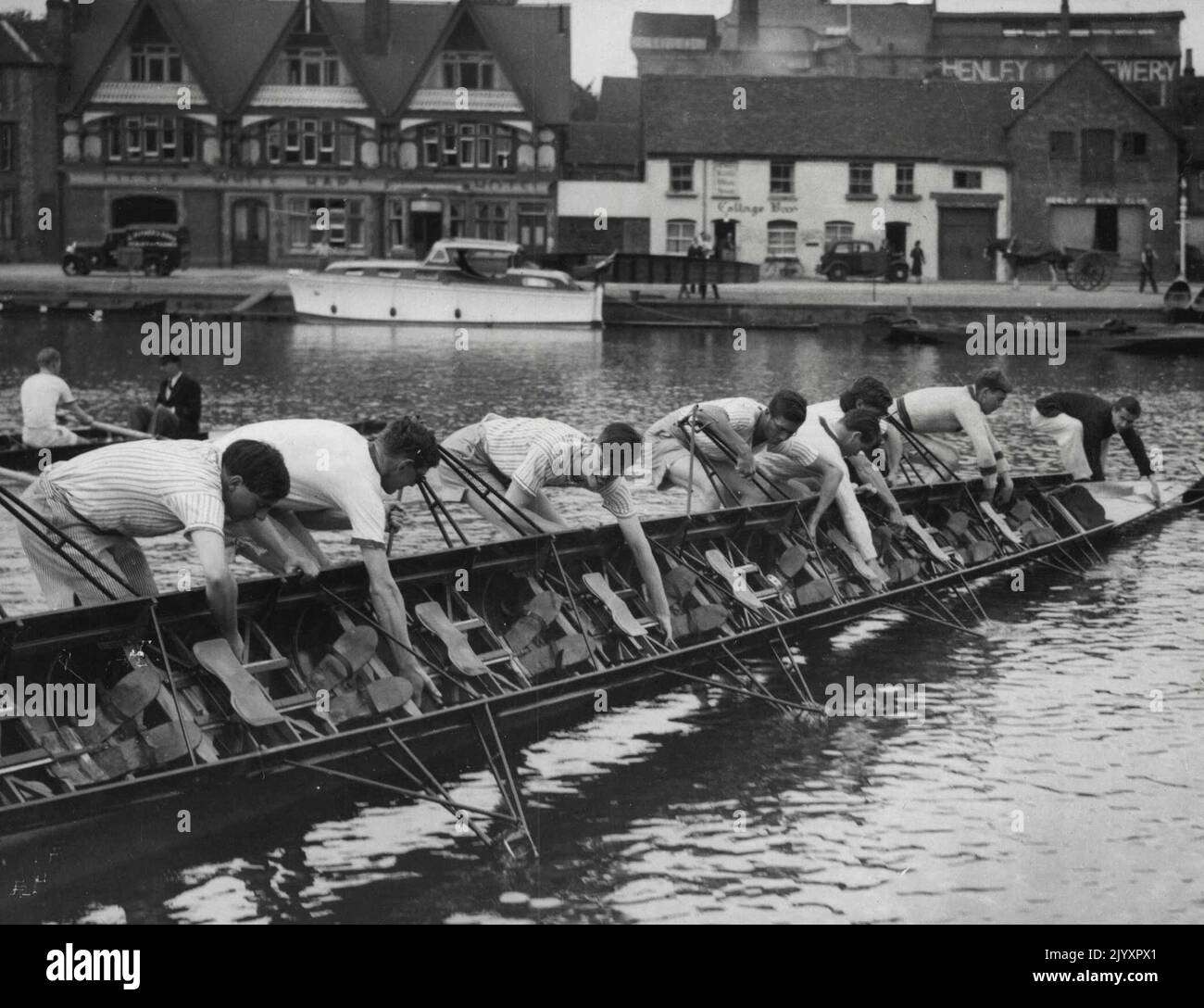 Preparing For Henley - First Trinity B Photographed Lowering the boat ...
