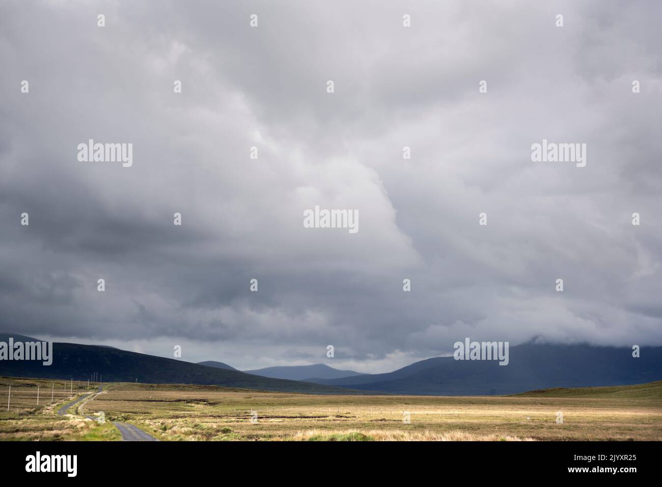Dark clouds over the mountains of Wild Nephin National Park in County ...