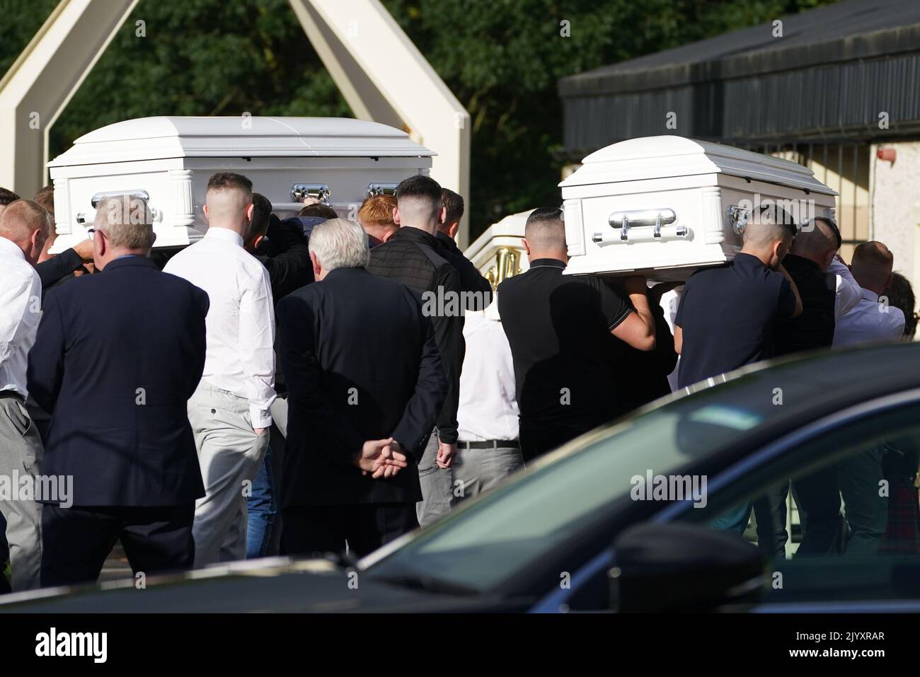 The coffins of Lisa Cash, 18, and her eight-year-old twin siblings ...
