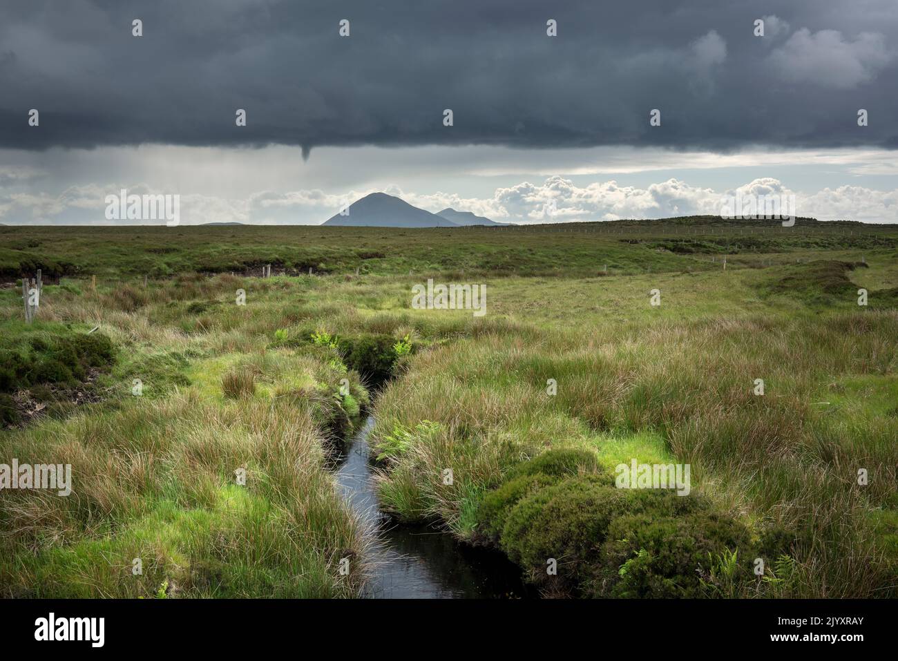 The vast peat landscape of county Mayo in Ireland, with Slievemore on ...
