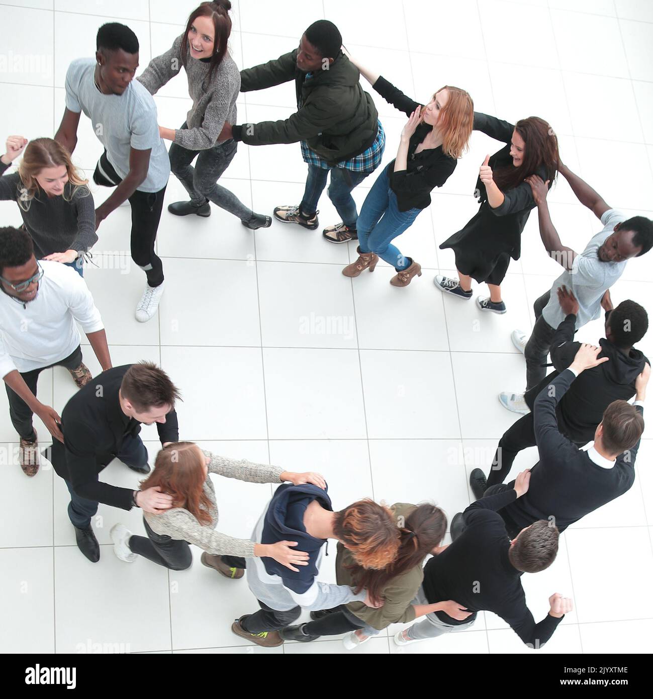 Large group of people in the shape of circle Stock Photo - Alamy