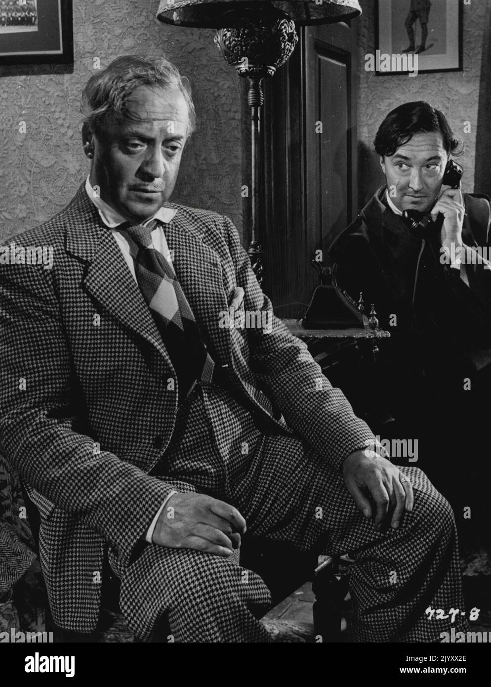 Basil Radford and Henry Mollison in a scene from "Whisky Galore ...