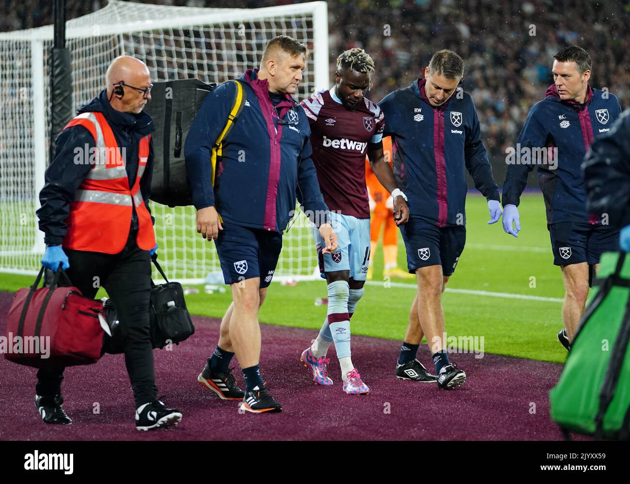 West Ham United's Maxwel Cornet leaves the game with an injury during ...