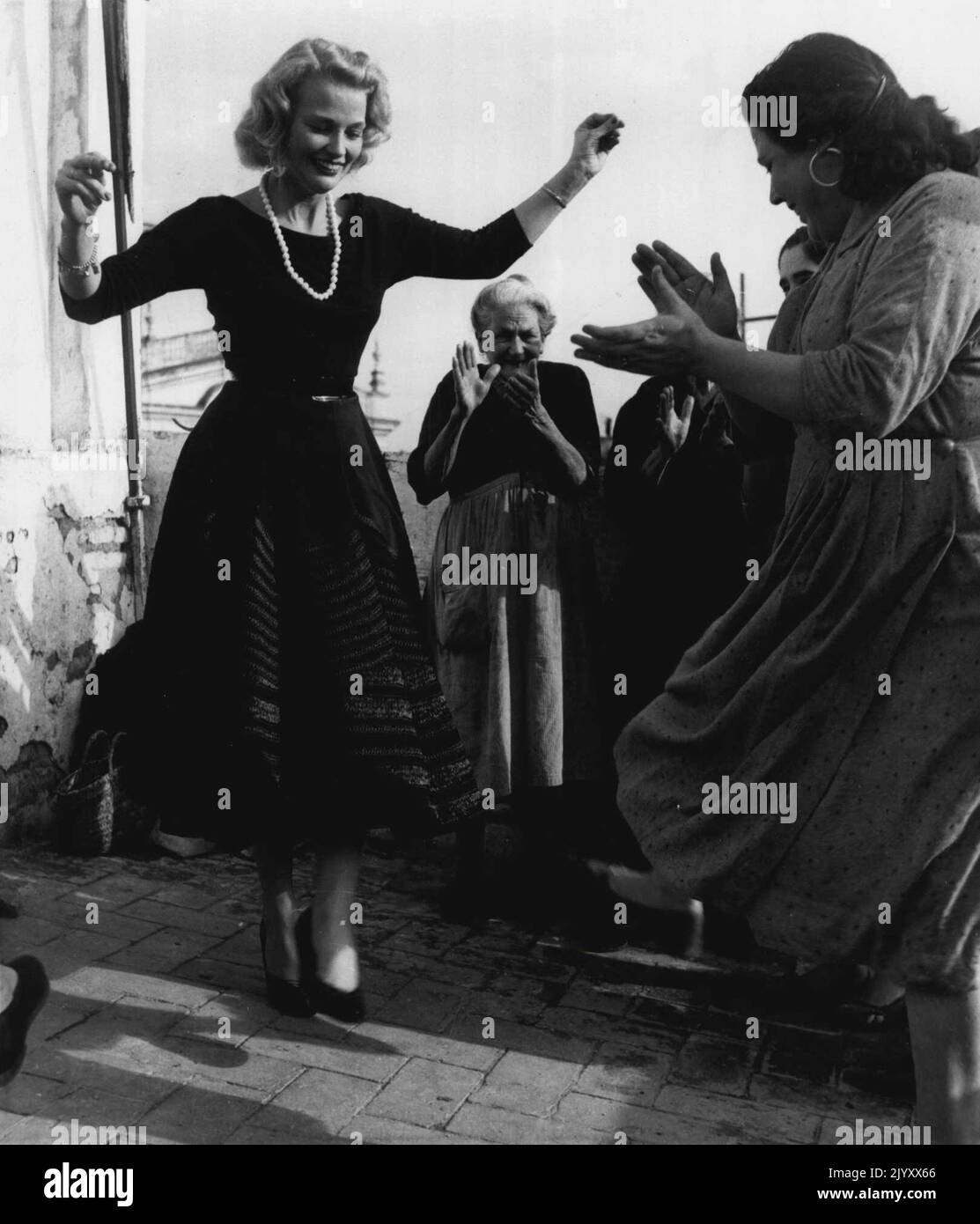 "Joan Finds Peace In Seville" -- All gypsies love dancing. So does £500 ...