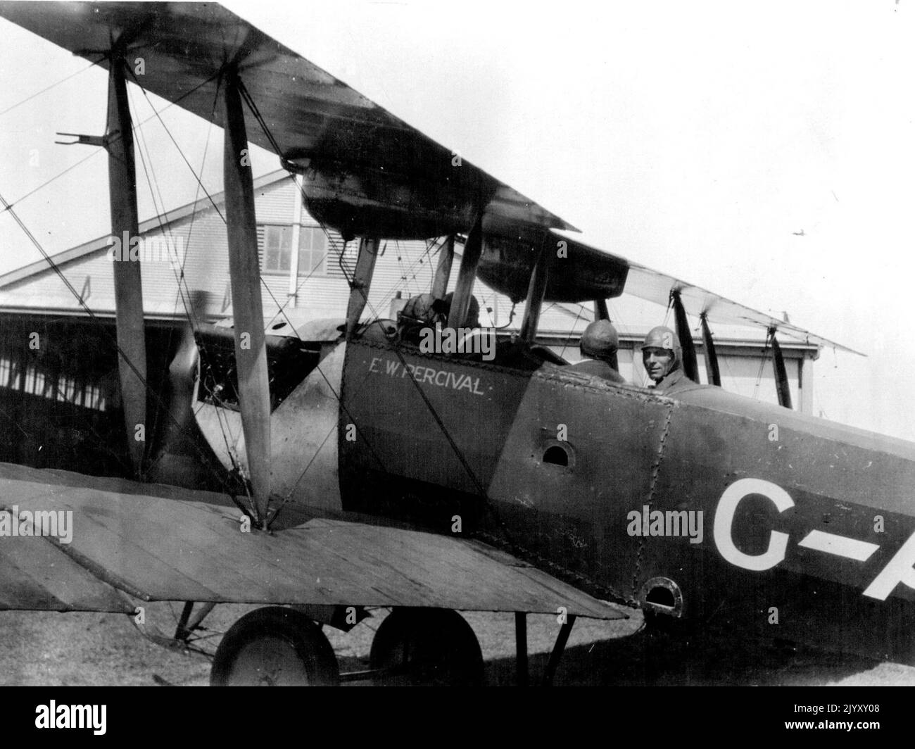 He first flew in an old-type biplane and decided it was too windy and ...
