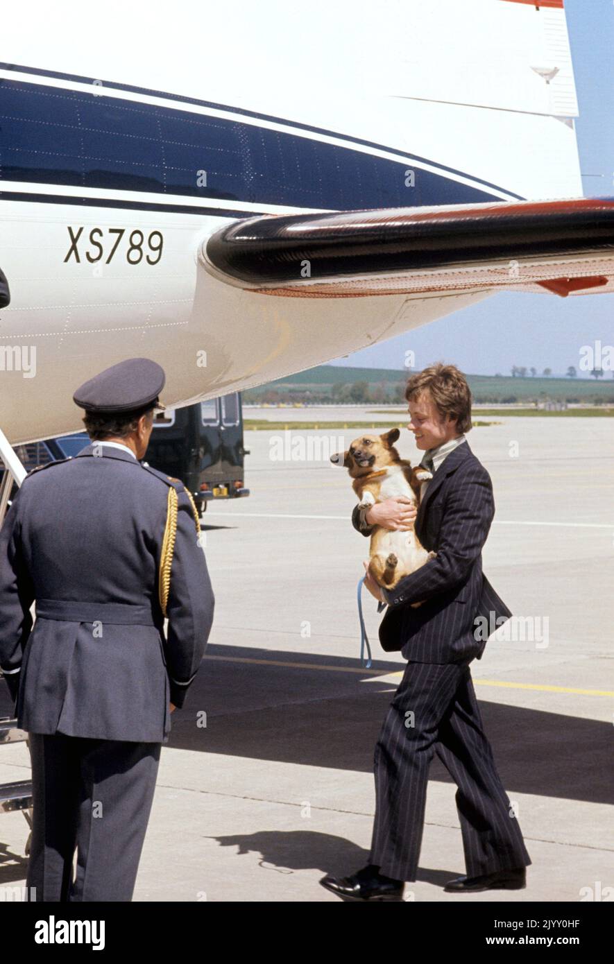 File photo dated 27/5/1977 of one of the royal Corgis being carried to ...