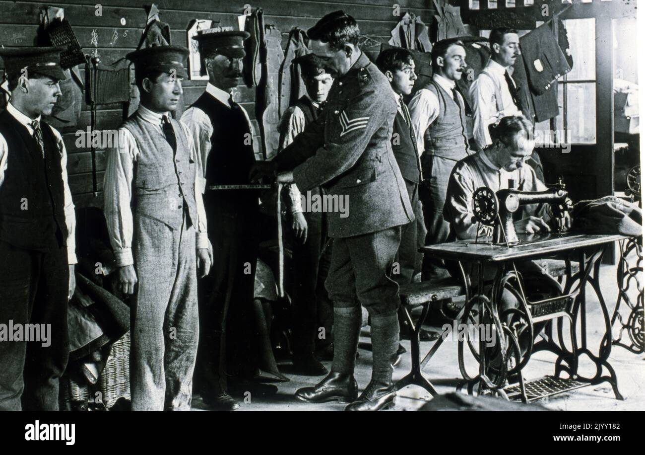 English volunteers at a British army recruitment office are measured ...