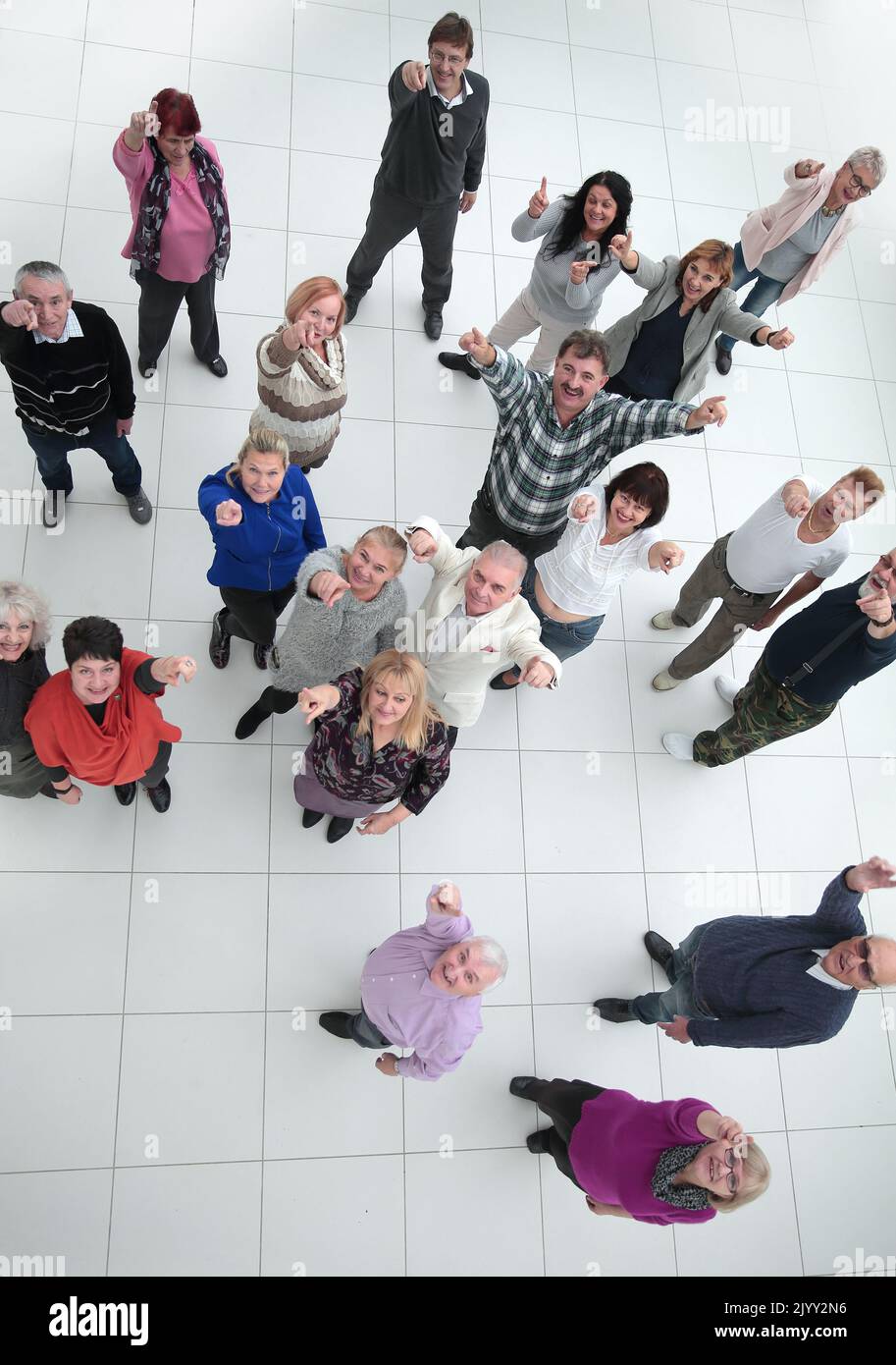 group of different mature people looking at the camera Stock Photo - Alamy