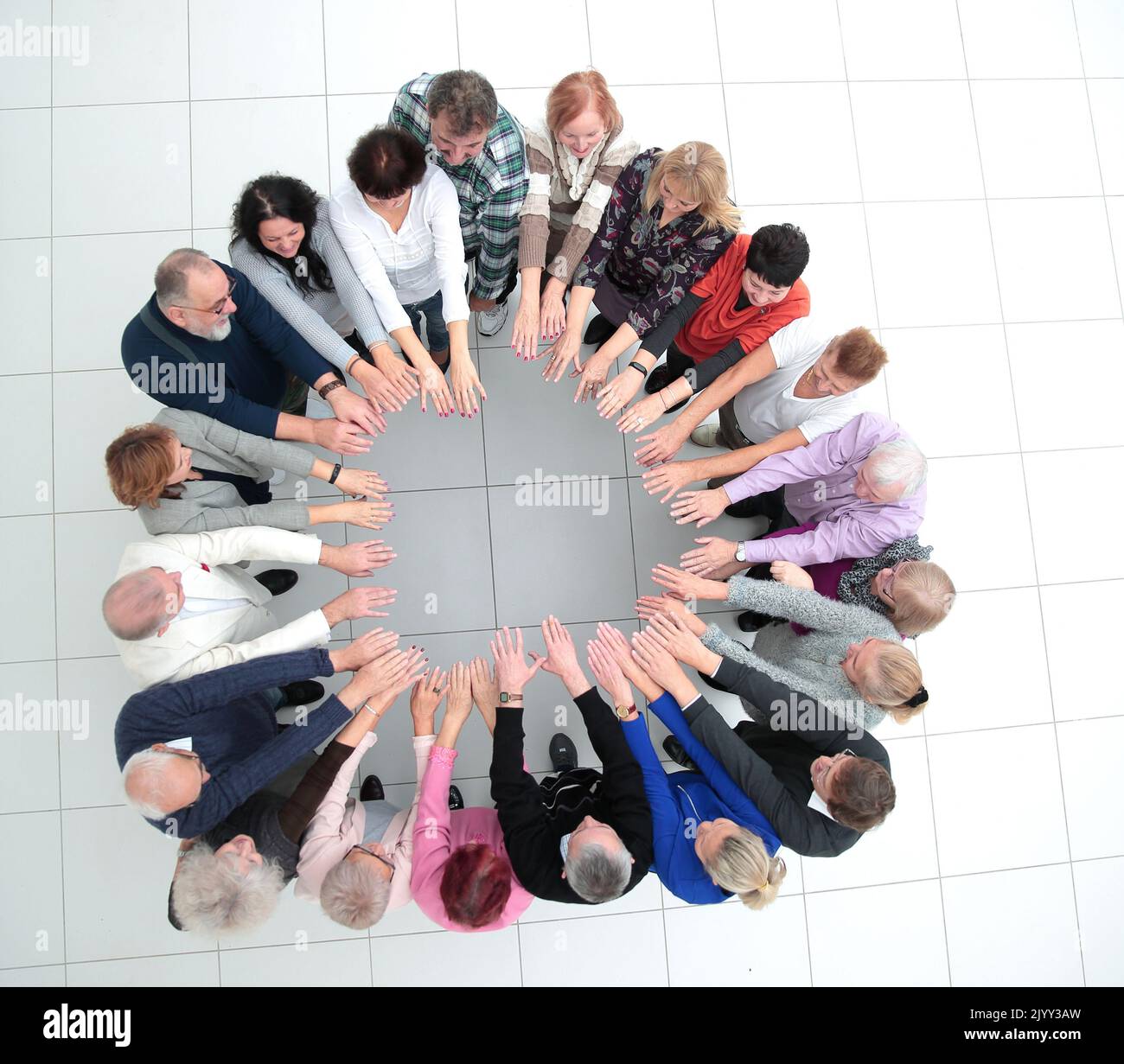group of mature people showing their unity Stock Photo - Alamy