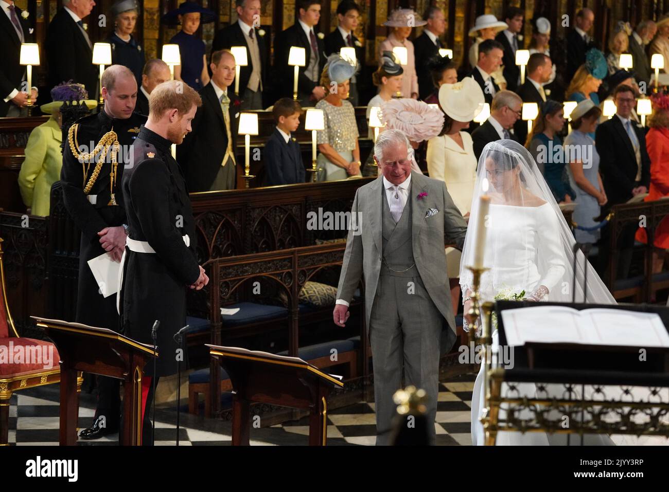 File photo dated 19/5/2018 of Prince Harry looking at his bride, Meghan ...