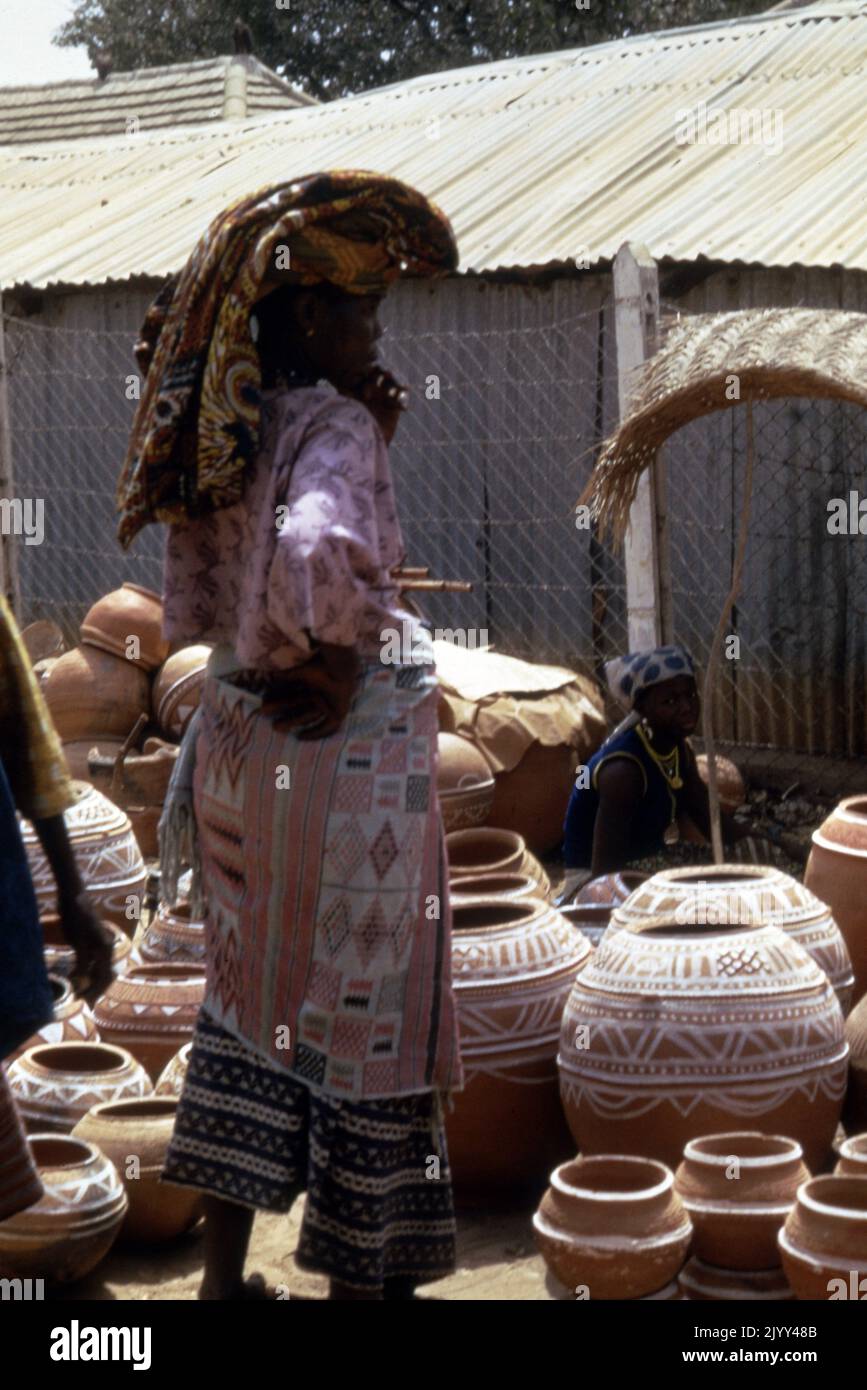 Nupe pottery on sale in a market in Nigeria. The Nupe, traditionally ...