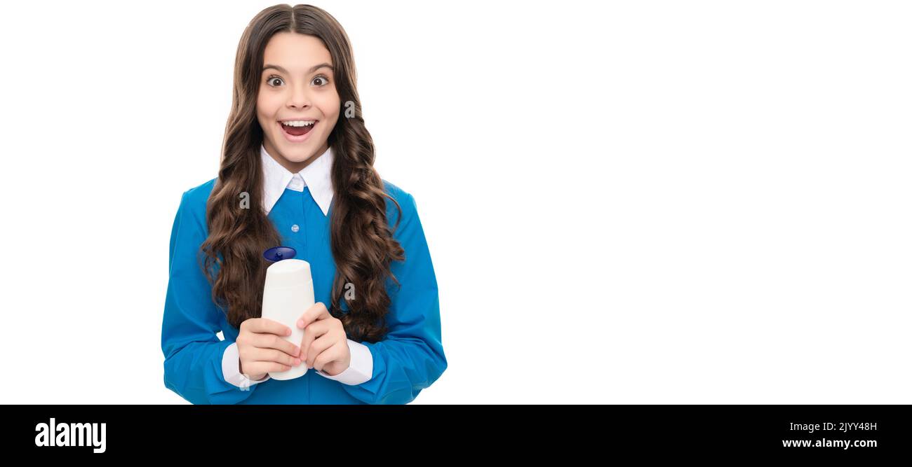 presenting cosmetic product for teen. teen girl use shampoo bottle ...