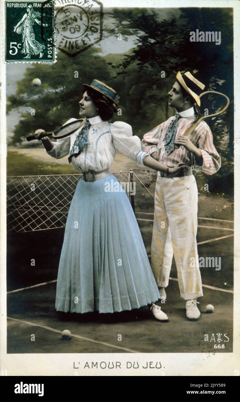 Romantic couple depicted on a tennis themed vintage postcard circa 1900 ...