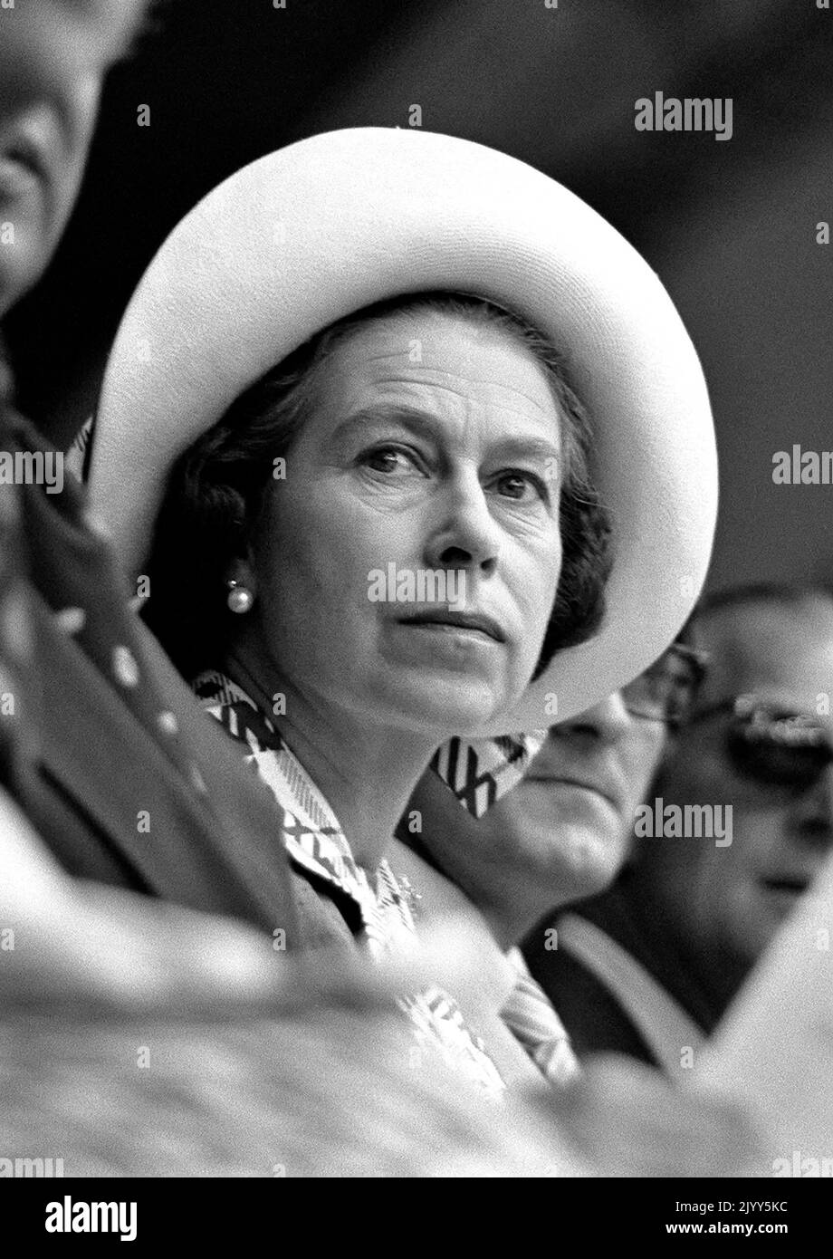 Queen Elizabeth II watches the Olympic swimming action in Montreal ...