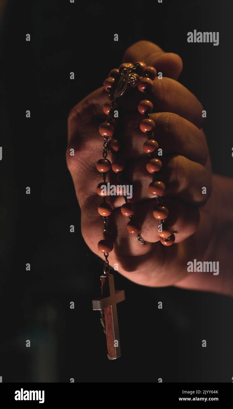 hand with rosary Stock Photo - Alamy