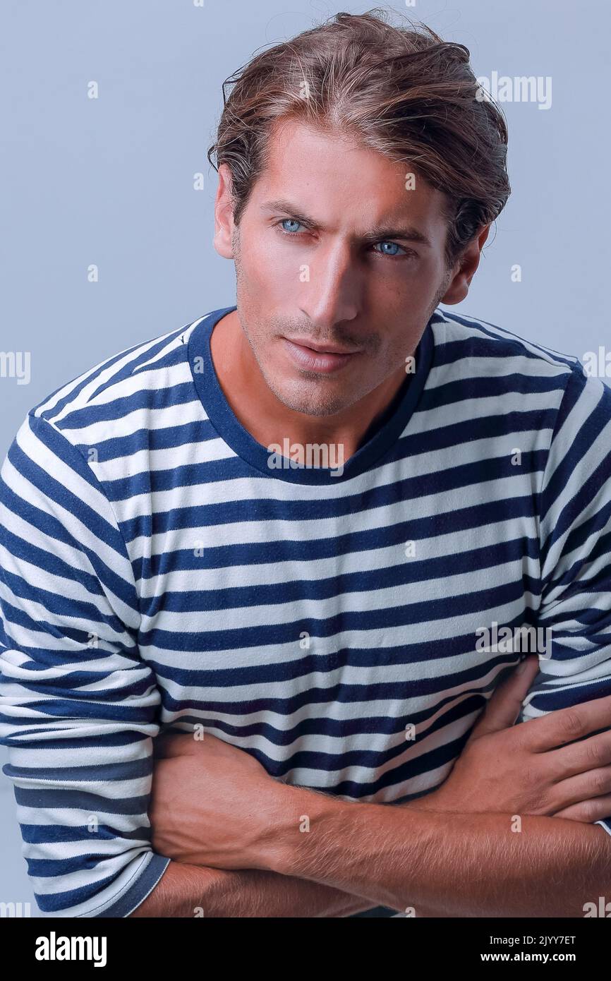 modern man standing in the corner of the white room Stock Photo - Alamy