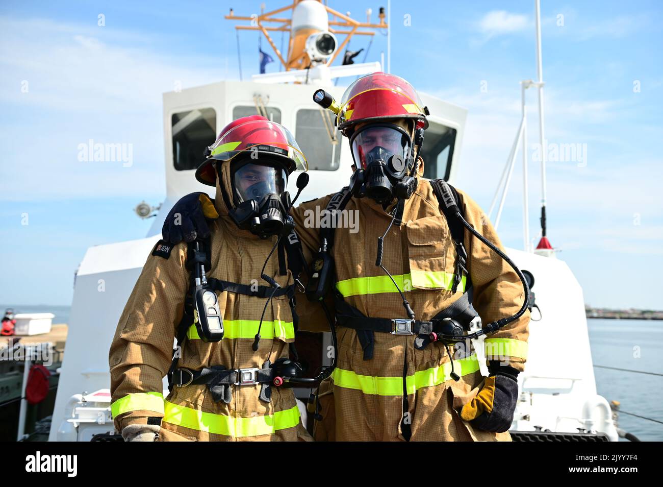 Members aboard CGC Sailfish learn how to properly don fire-fighting ...