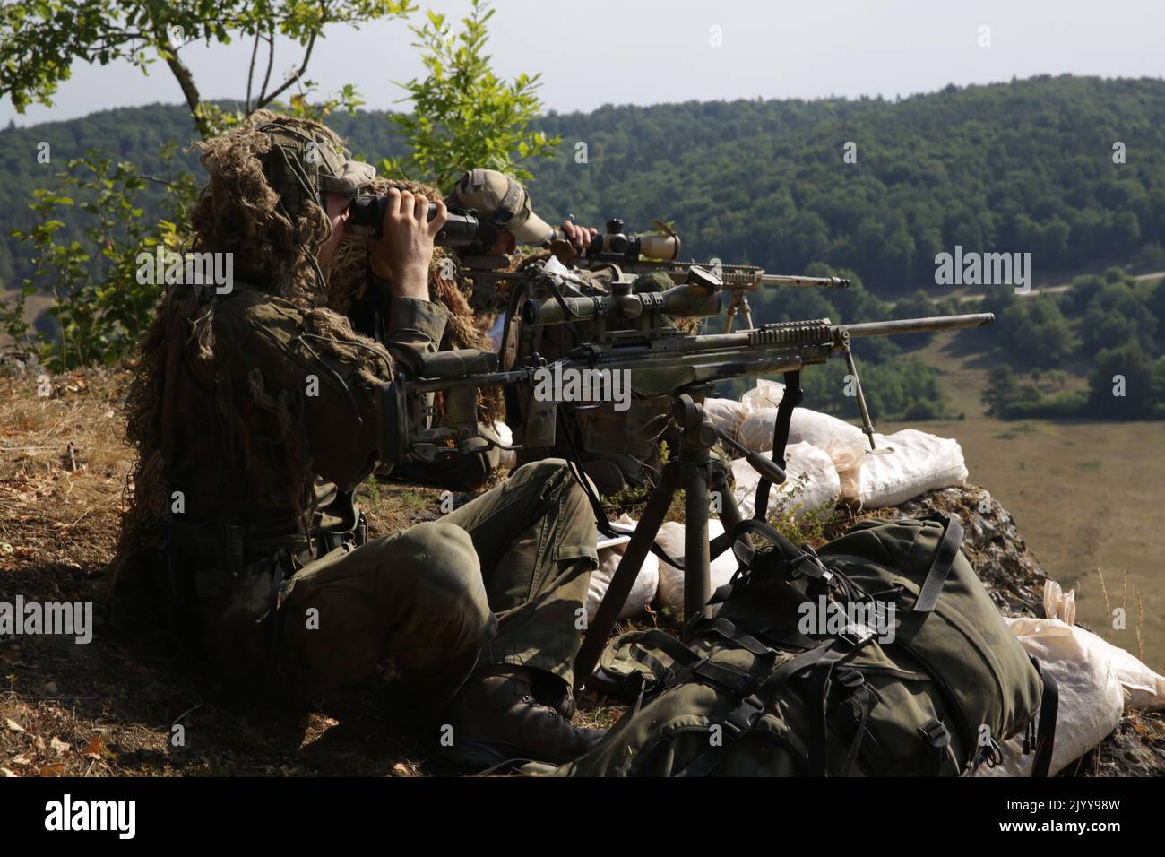 A sniper team prepares to shoot during the European Best Sniper Team ...