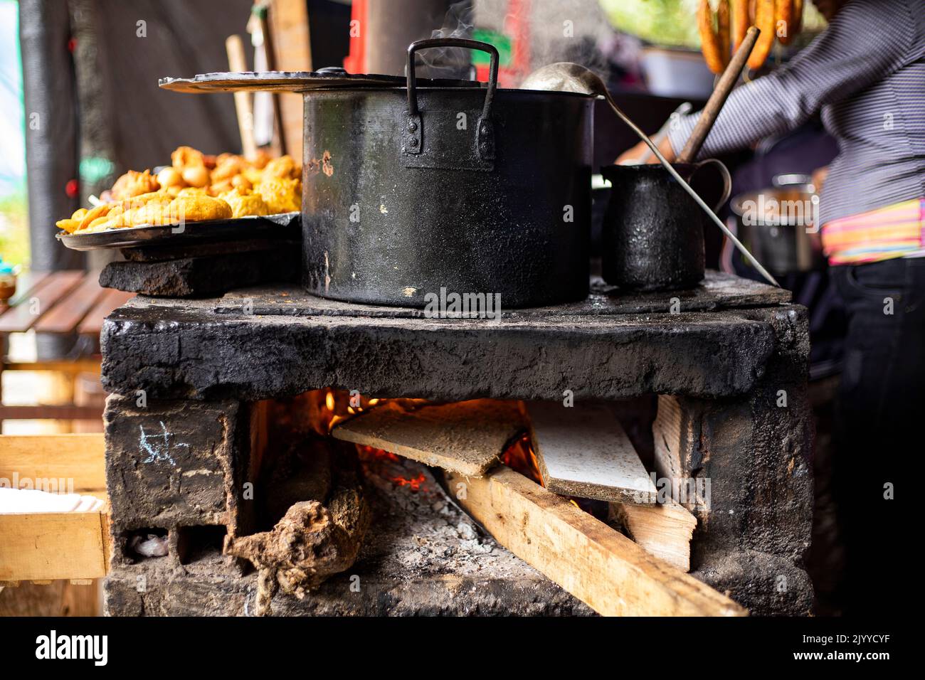 Old pot with soot cooking with steam in a wood stove - Typical ...